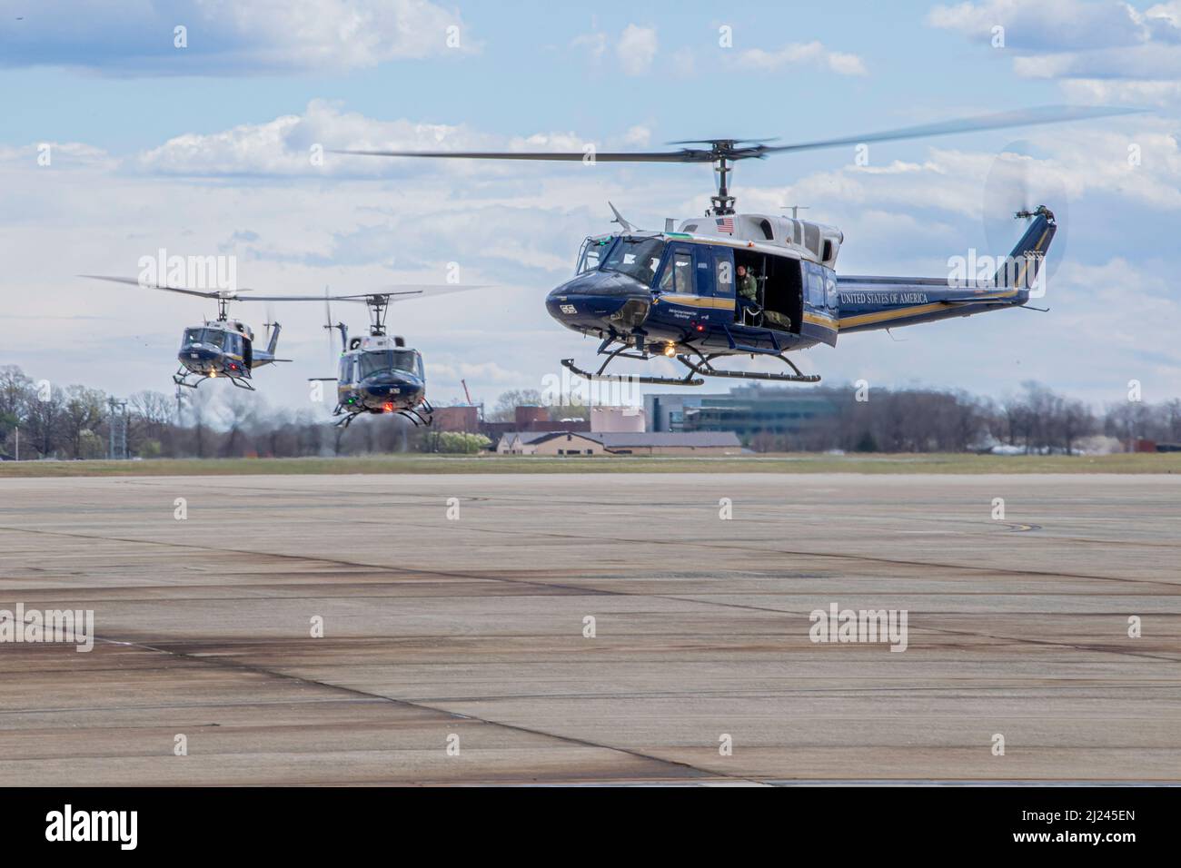 UH-1N Huey helicopters assigned to the First Helicopter Squadron (1 HS ...