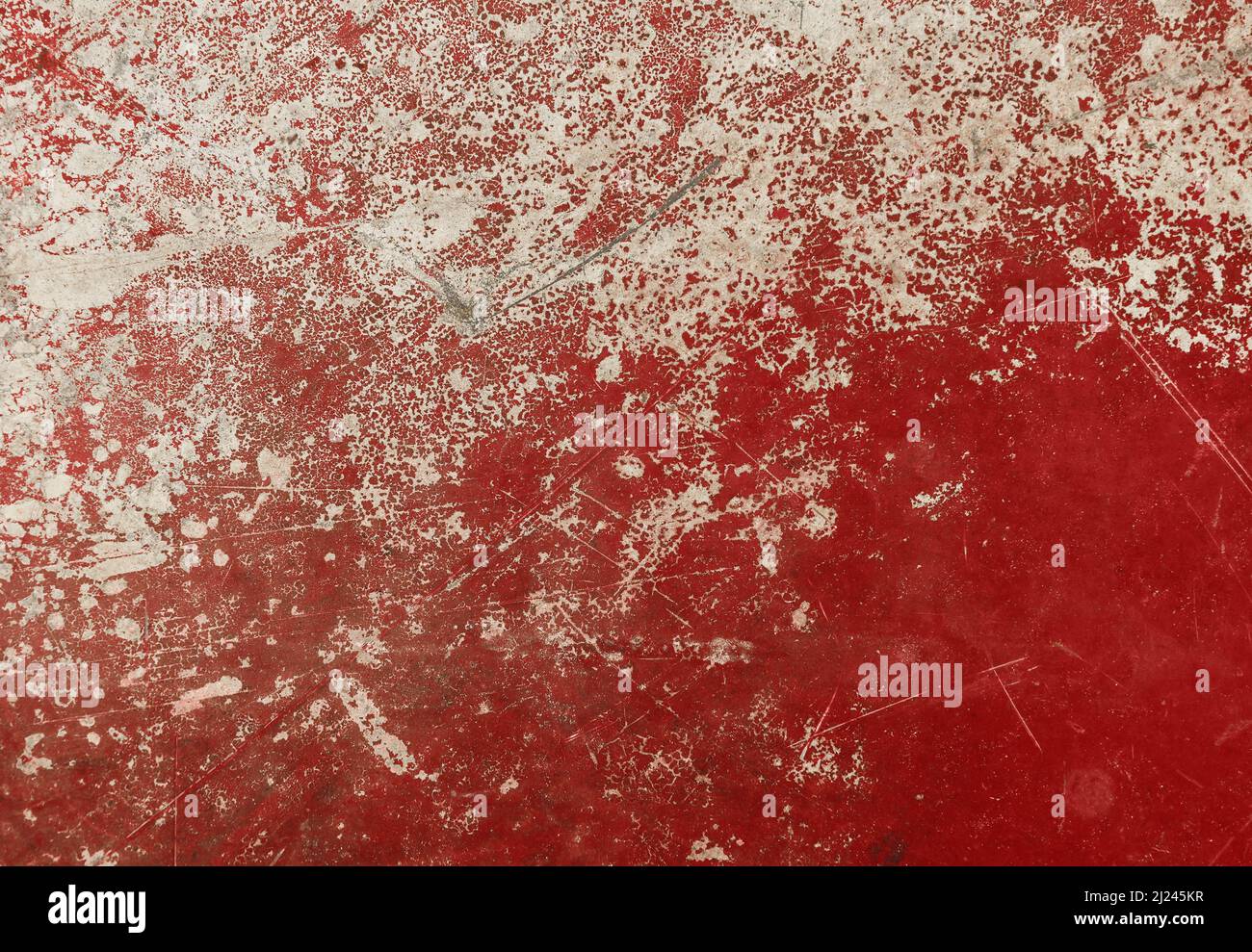 Grunge grey uneven stone surface texture background with dark stains ...