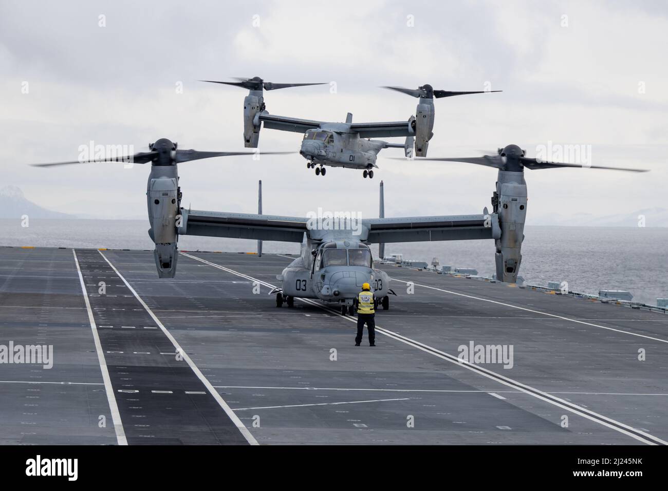 U.S. Marines land two MV-22B Ospreys on the HMS Prince of Wales during Exercise Cold Response ...