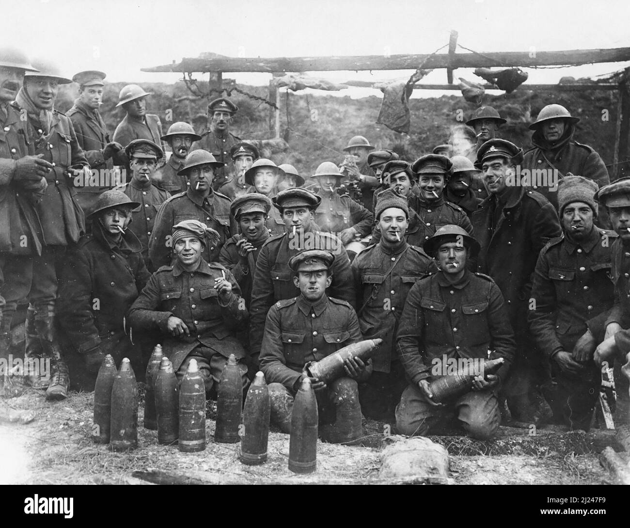 Troops posing while smoking cigarettes. This image may have been taken ...