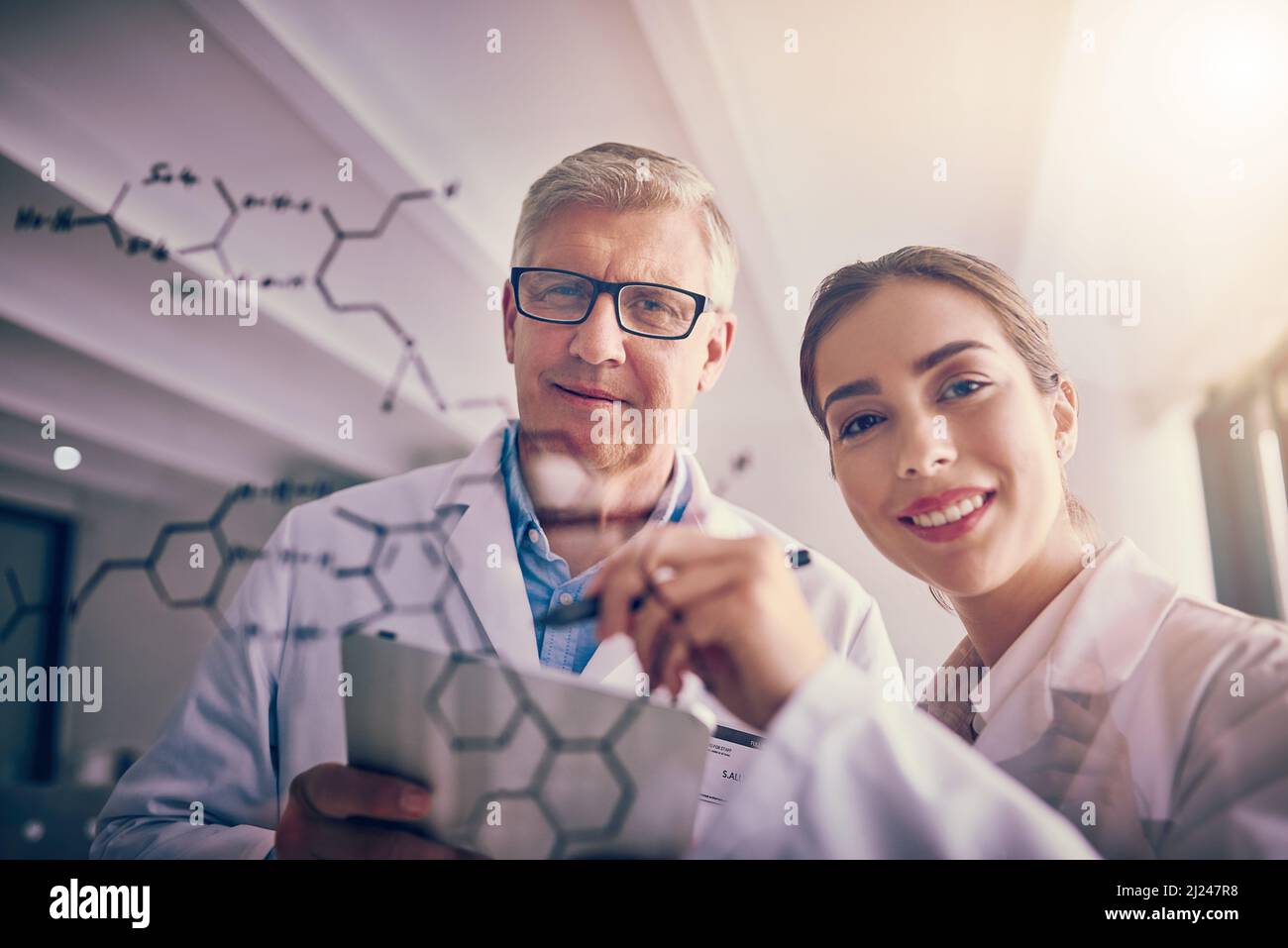 We are always busy with formulas and equations. Portrait of two focused ...