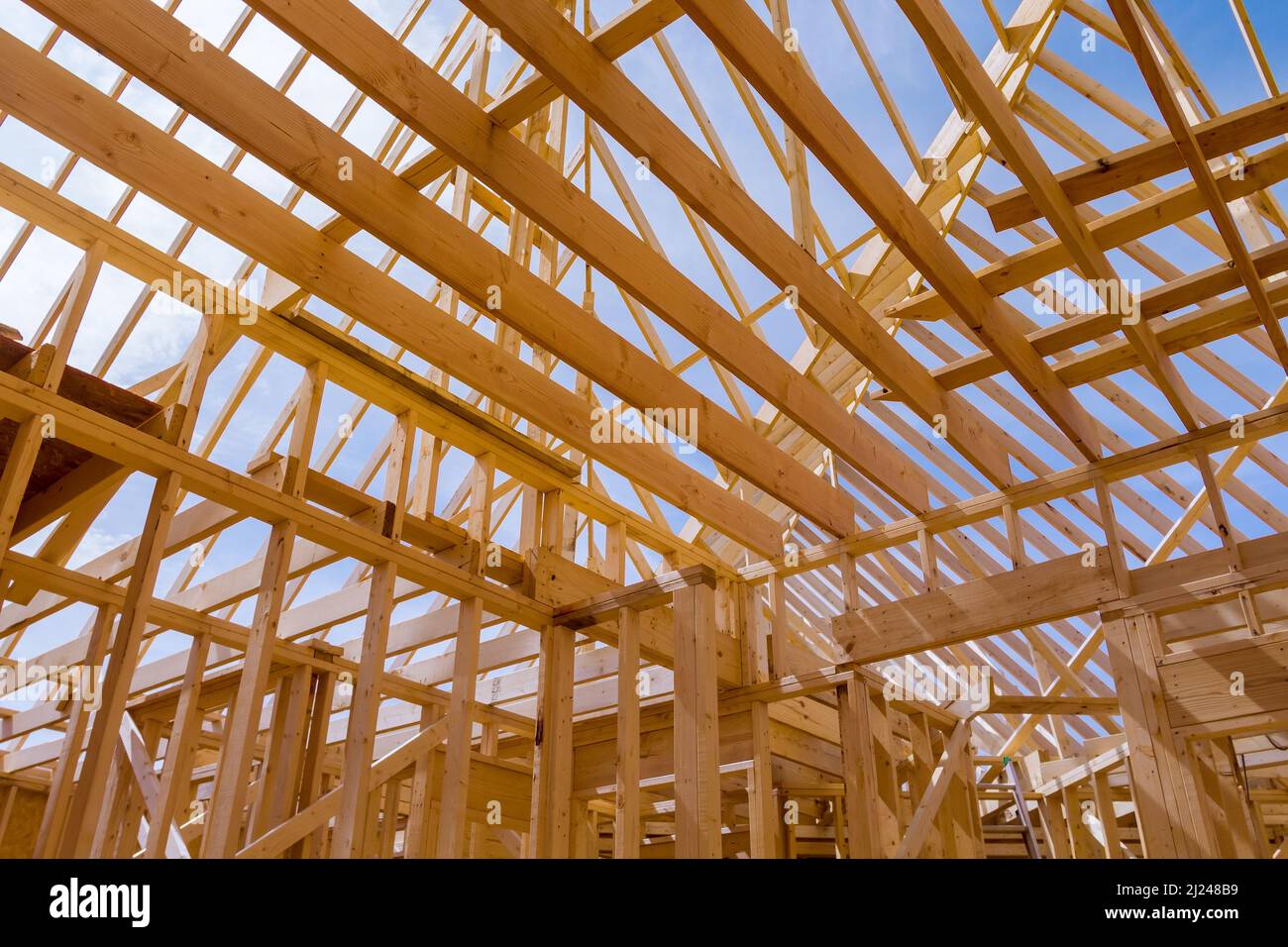 Framed building residential home with wood roof trusses Stock Photo - Alamy