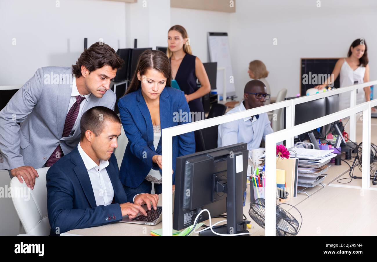 Friendly women and men in office Stock Photo - Alamy