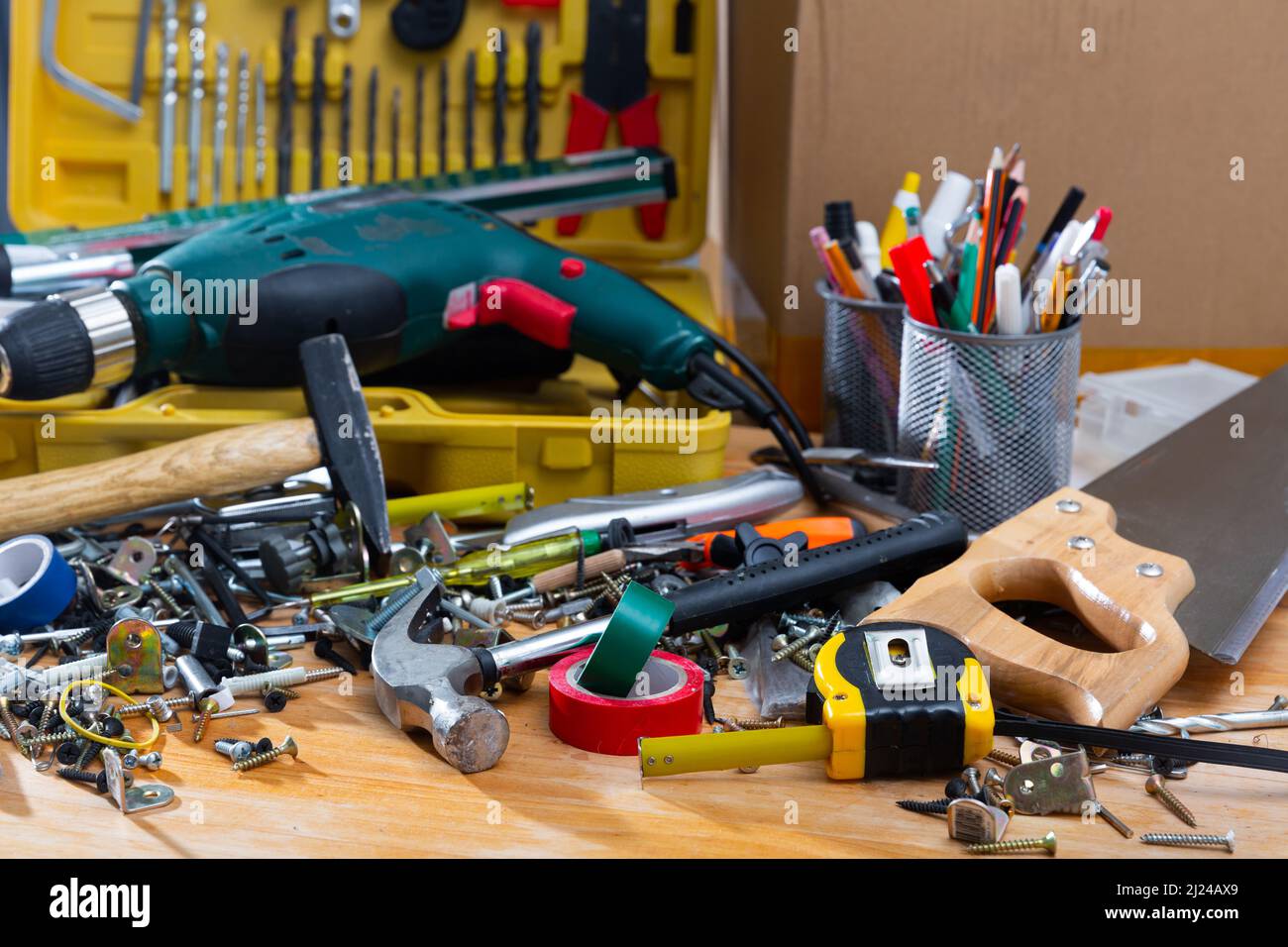 Repair tools on wooden background Stock Photo - Alamy