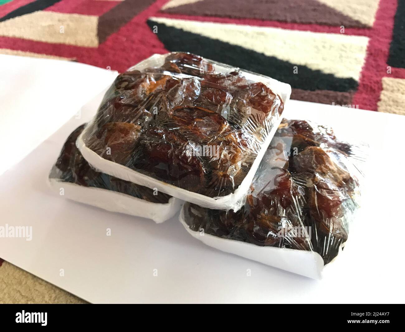 Fresh dates fruit. Pile of delicious dried dates isolated. Medjool ...