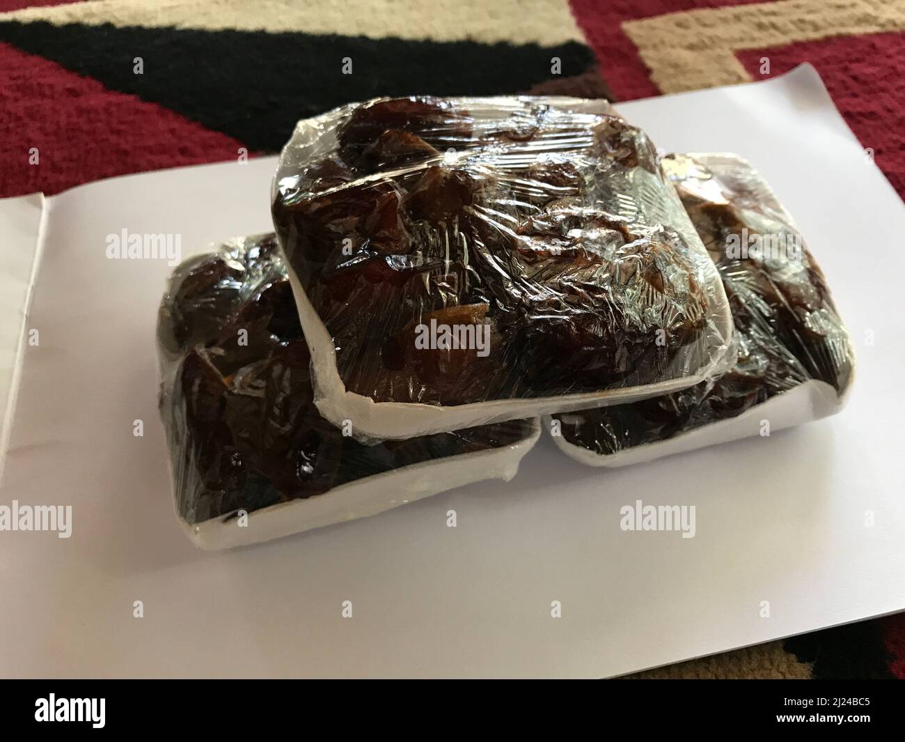 Fresh dates fruit. Pile of delicious dried dates isolated. Medjool ...