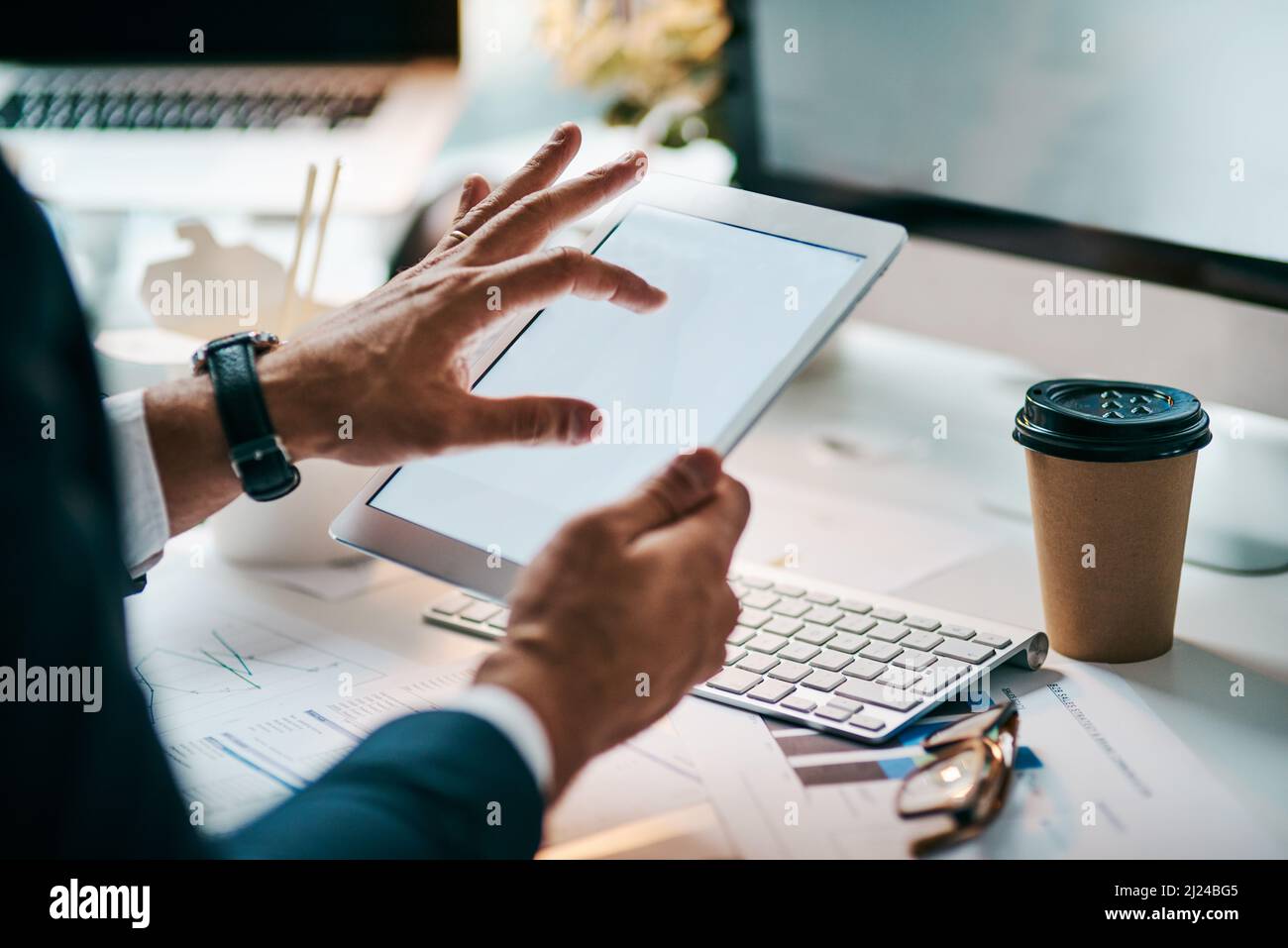 Tablets are so helpful in this day and age. Shot of an unrecognizable ...