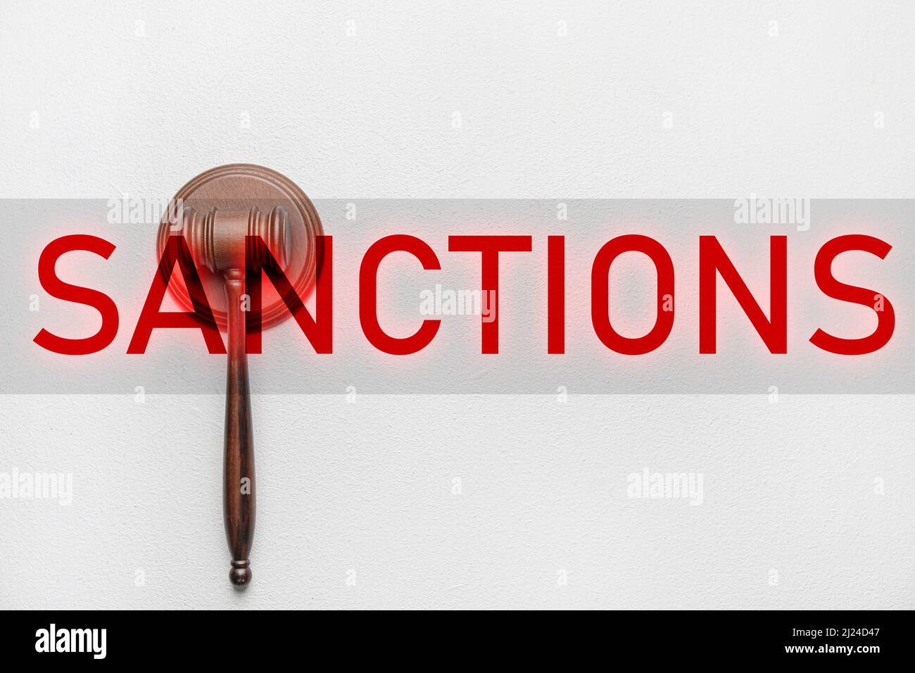 Judge's gavel and word SANCTIONS on white background Stock Photo - Alamy
