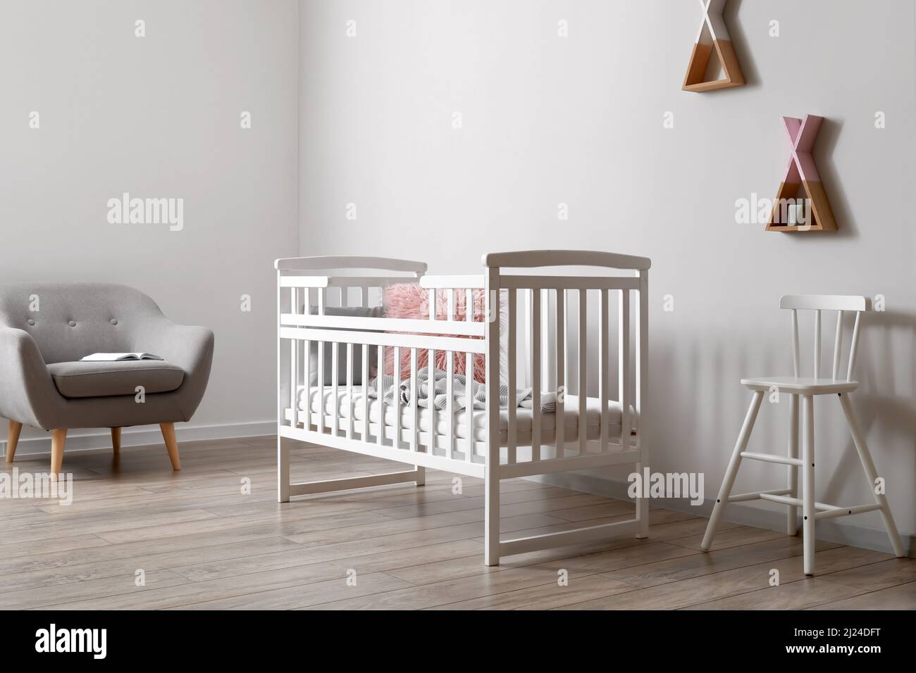 Interior of modern children's room with crib Stock Photo - Alamy