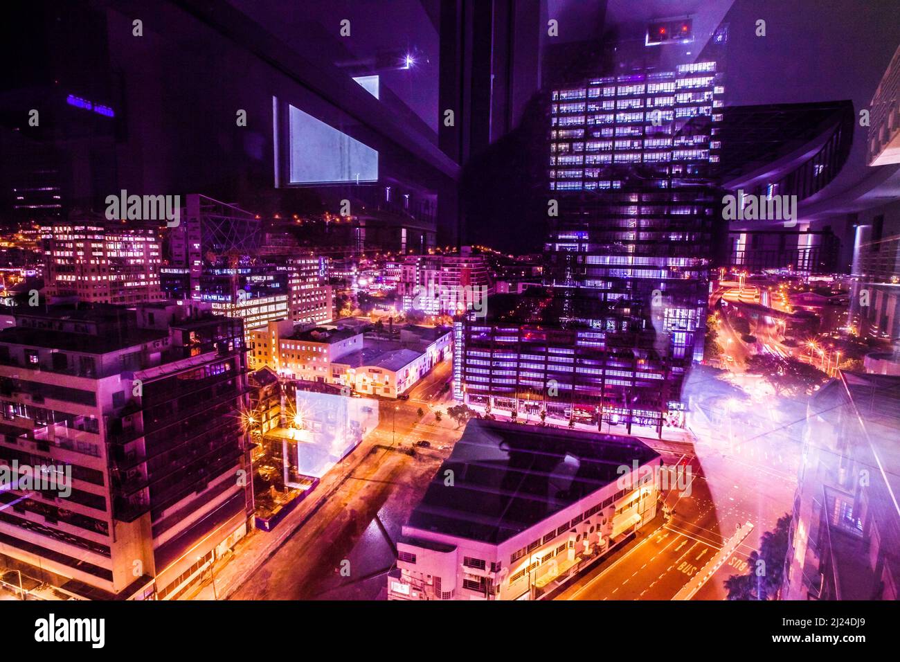 Bright lights of the urban jungle. Scenes of city life Stock Photo - Alamy