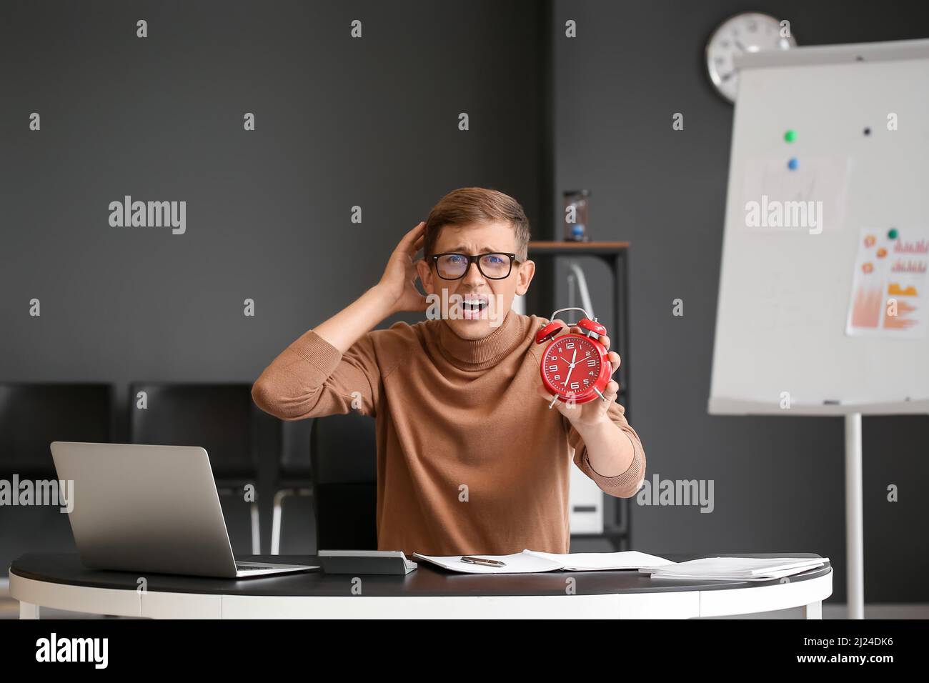 Angry man alarm clock in hi-res stock photography and images - Alamy