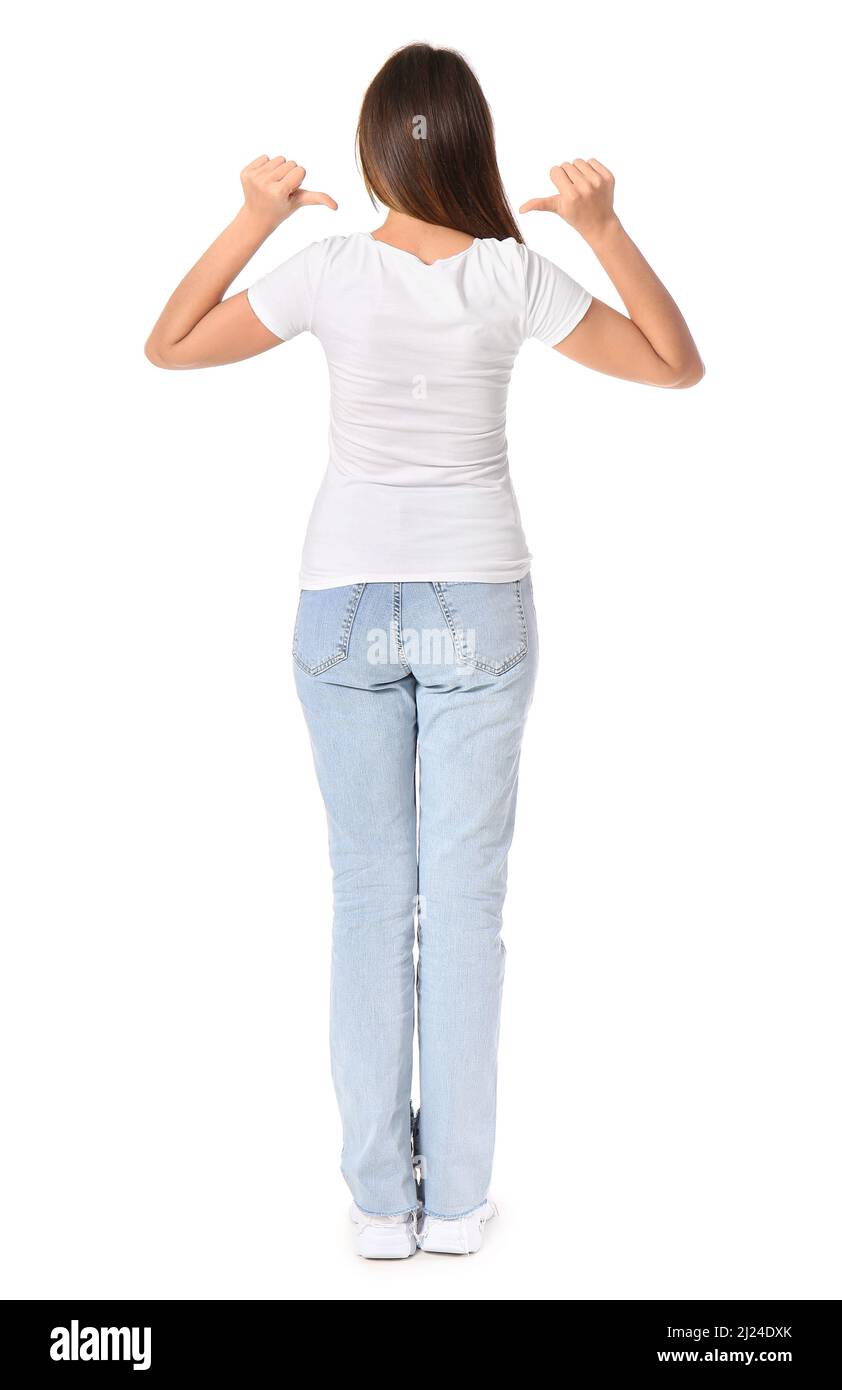 Young woman in blank t-shirt on white background, back view Stock Photo ...