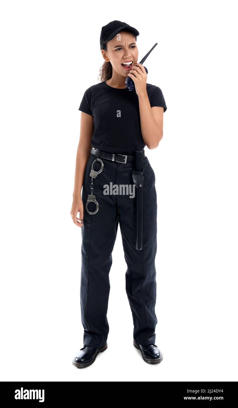 African-American female security guard shouting into radio transmitter ...
