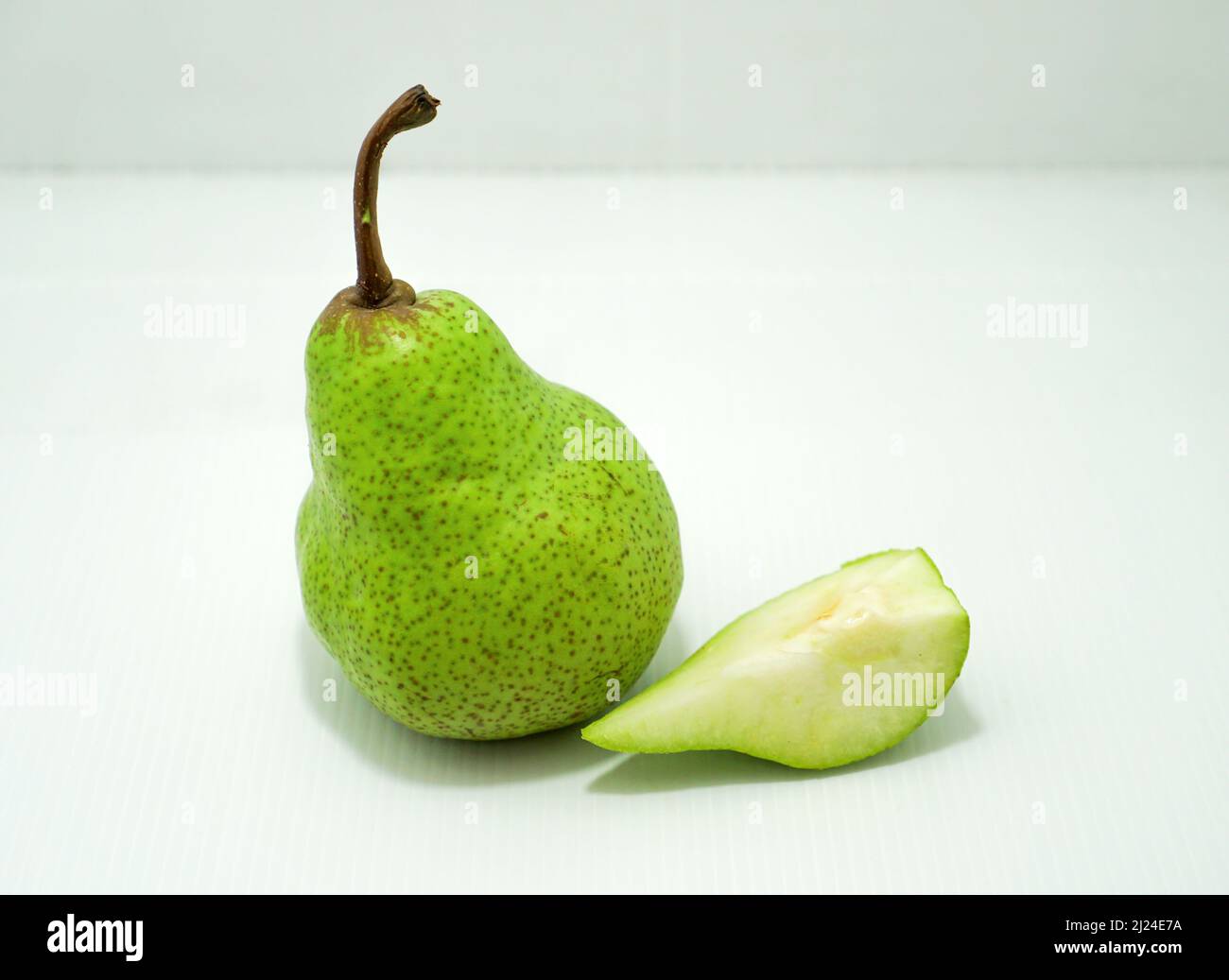 Pear cut in slices hi-res stock photography and images - Alamy