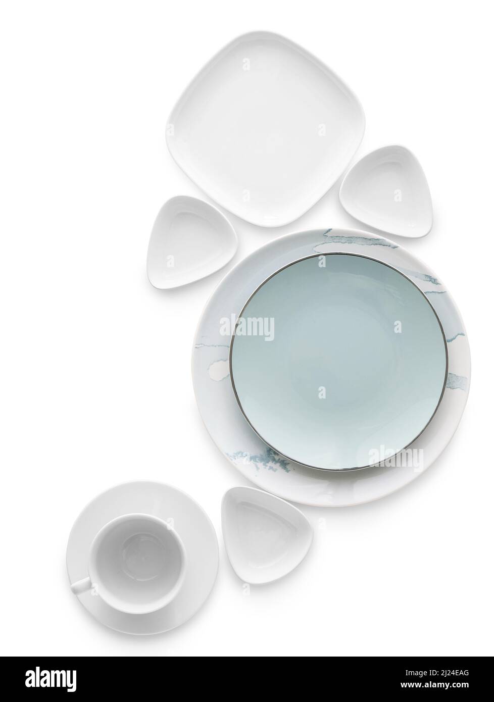 Set of stylish dinnerware on white background Stock Photo - Alamy