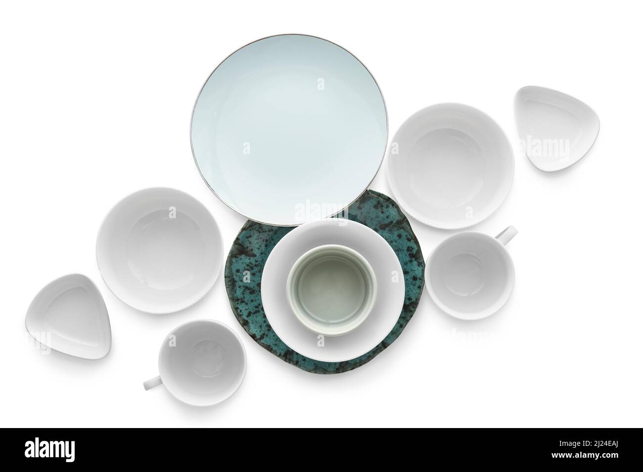 Set of stylish dinnerware on white background Stock Photo - Alamy