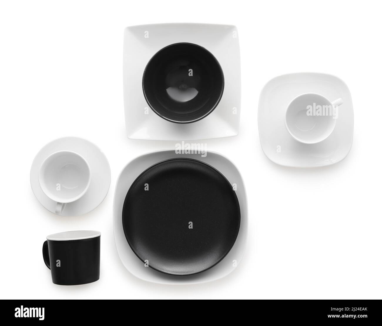 Set of stylish dinnerware on white background Stock Photo - Alamy