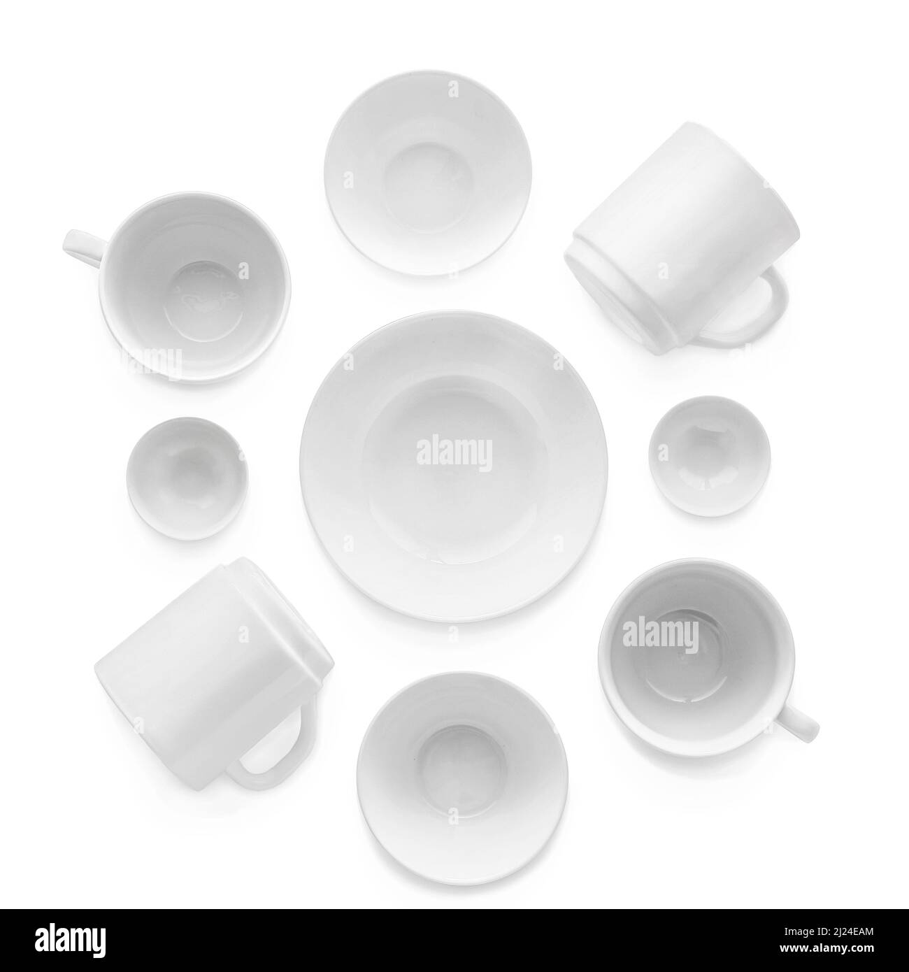 Set of stylish dinnerware on white background Stock Photo - Alamy