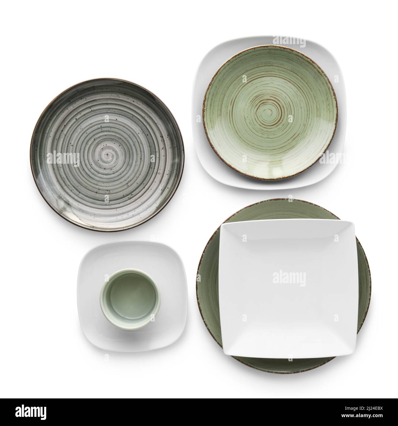 Set of stylish dinnerware on white background Stock Photo - Alamy