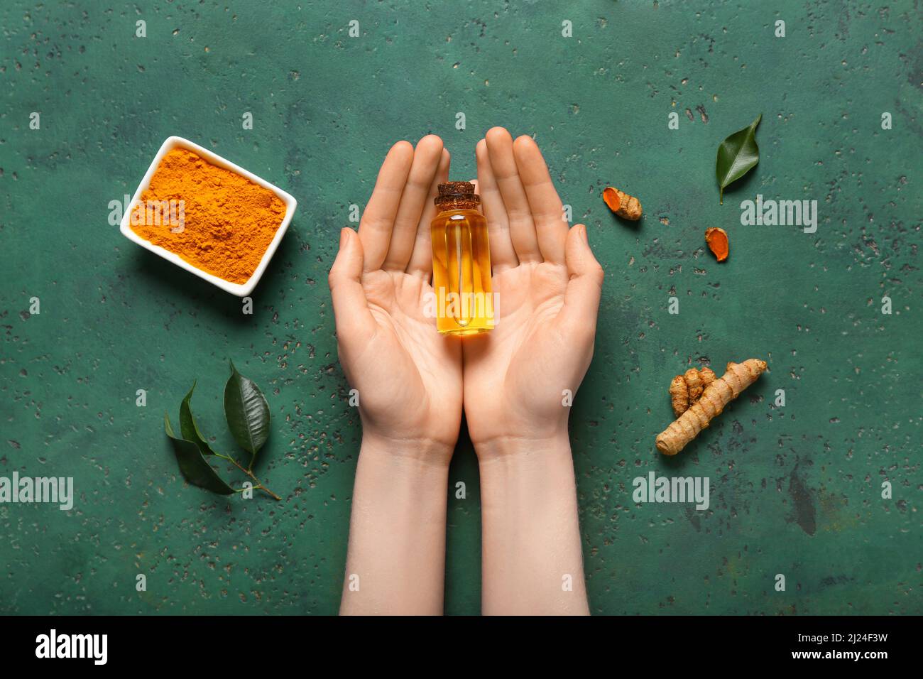 Female hands turmeric powder hi-res stock photography and images - Alamy