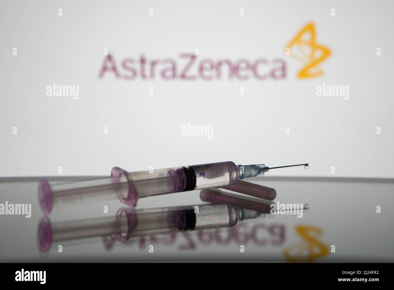 In this photo illustration, a medical syringe seen displayed on a ...