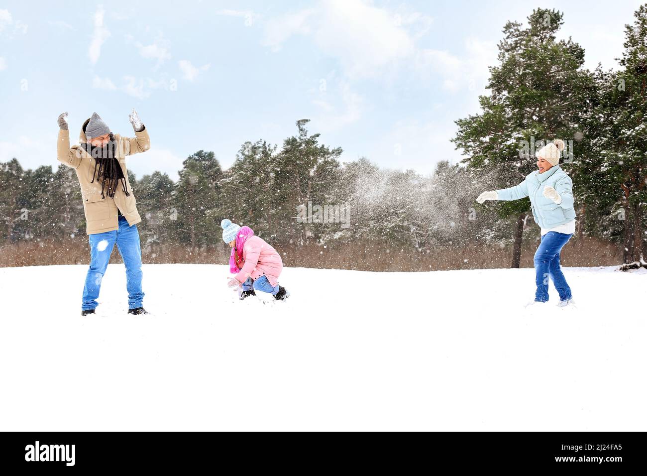 Person throwing snowballs hi-res stock photography and images - Alamy