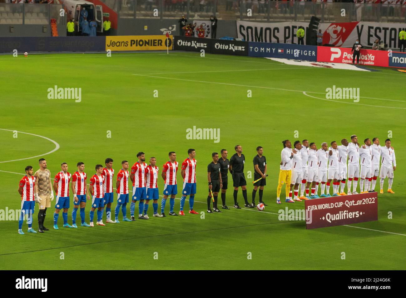 March 29, 2021, Lima, Peru: The teams of Paraguay (l) and Peru (r) line ...