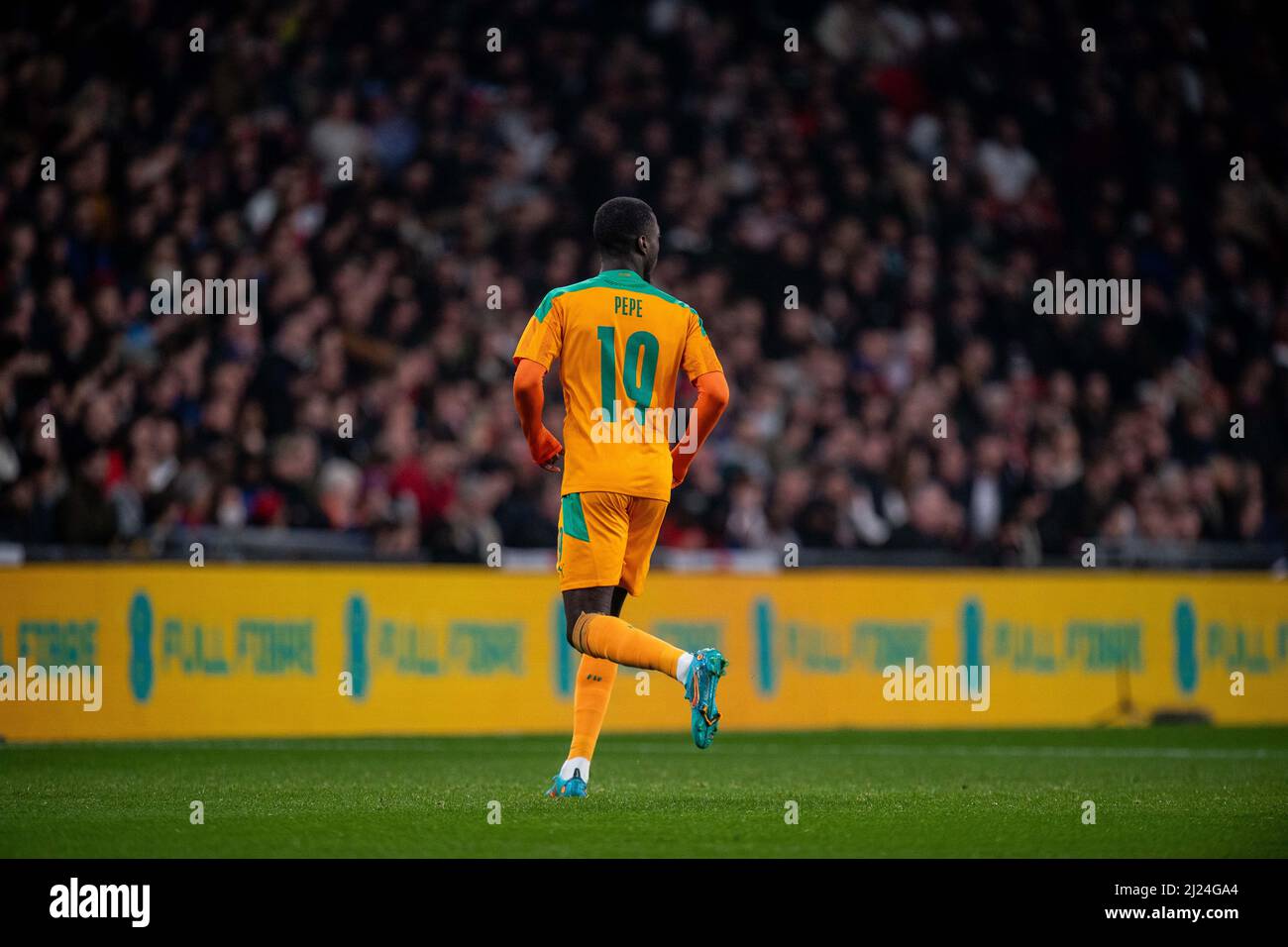 LONDON, ENGLAND - MARCH 29: Nicolas Pepe of Côte d'Ivoire during the ...