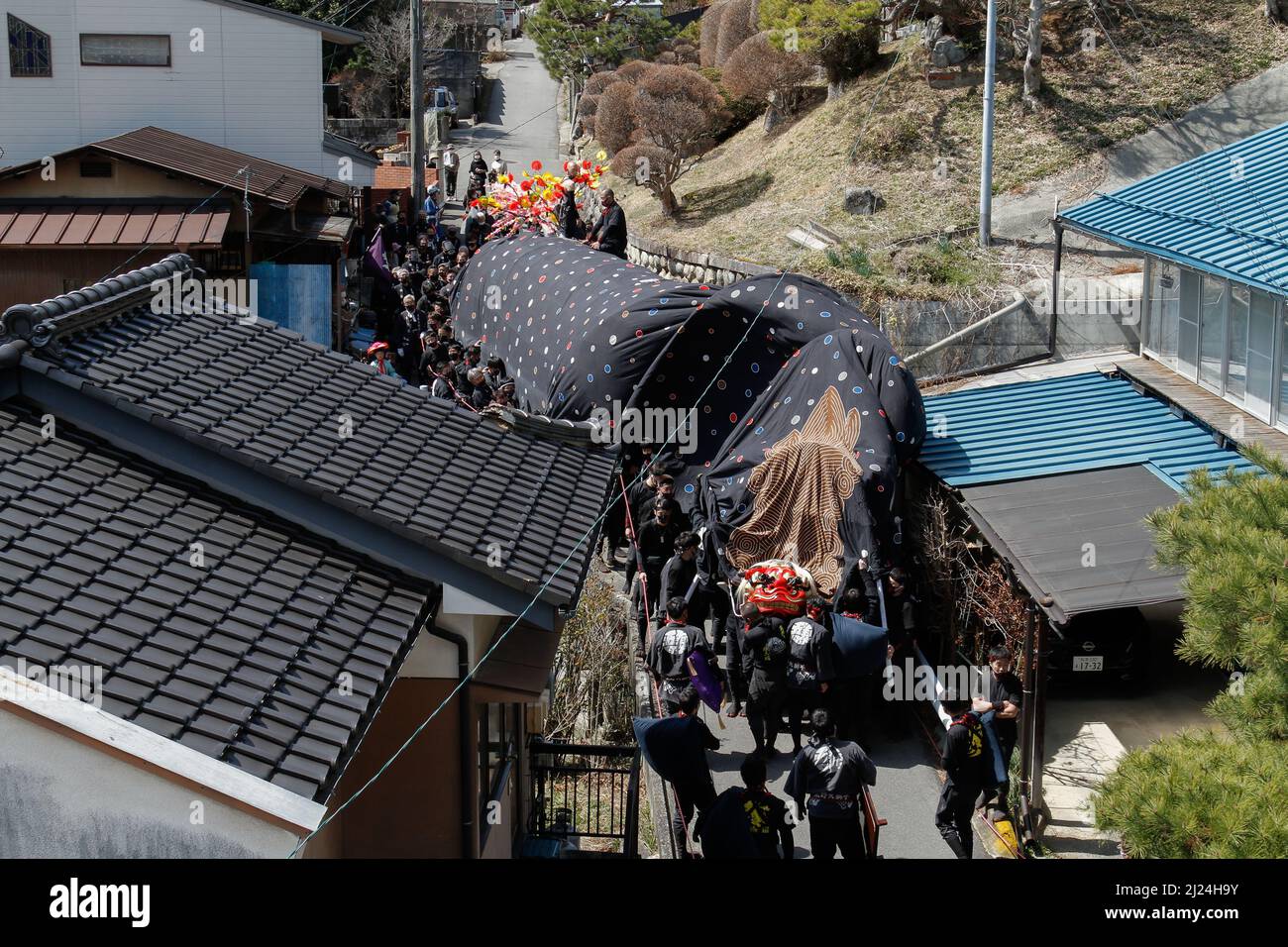 iida, nagano, japan, 2022/24/03 , The lion called shisha got stuck on ...