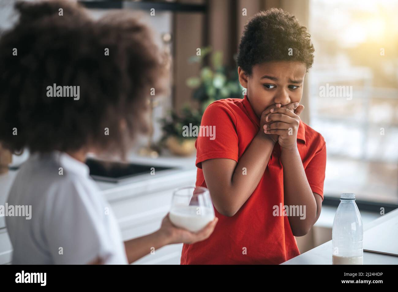 African american boy in red shirt hi-res stock photography and images ...
