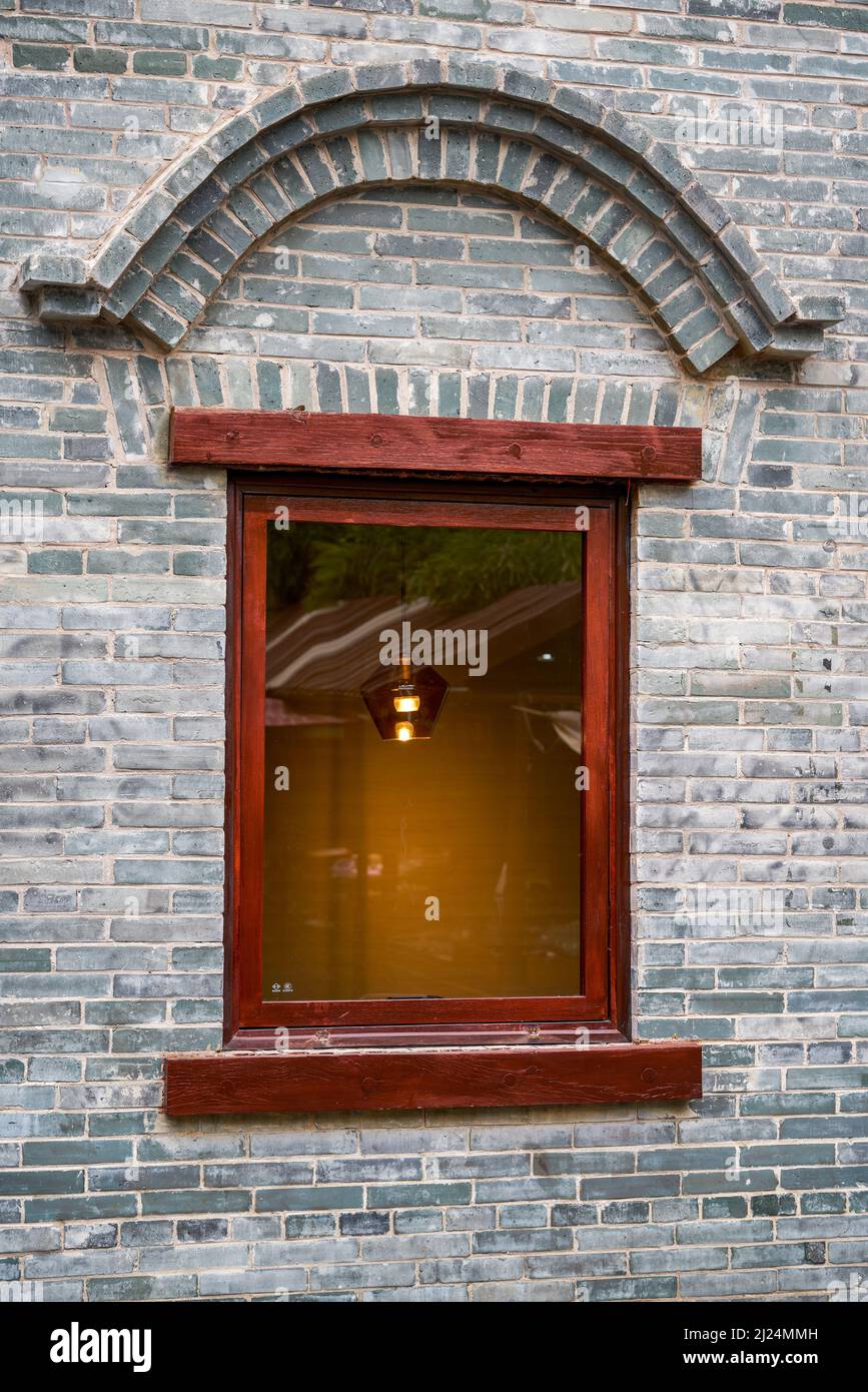 Close-up of traditional glass and wooden windows in ancient Chinese ...