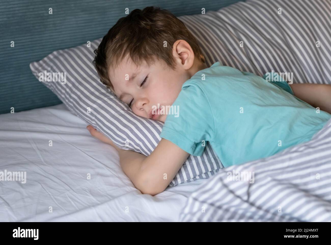 Little baby napping in the nursery. Closeup boy sleeping peacefully ...