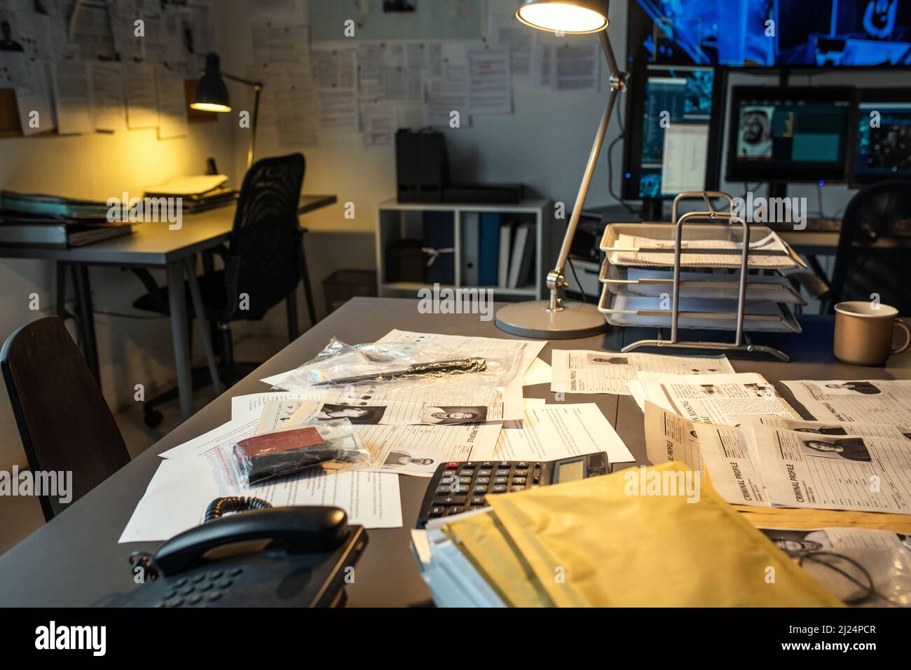 Part of workplace of modern fbi agent with documents, evidences ...