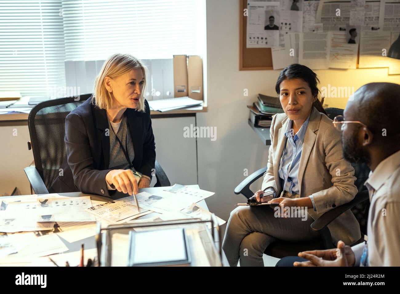 Group of confident agents of FBI or intelligence service department ...