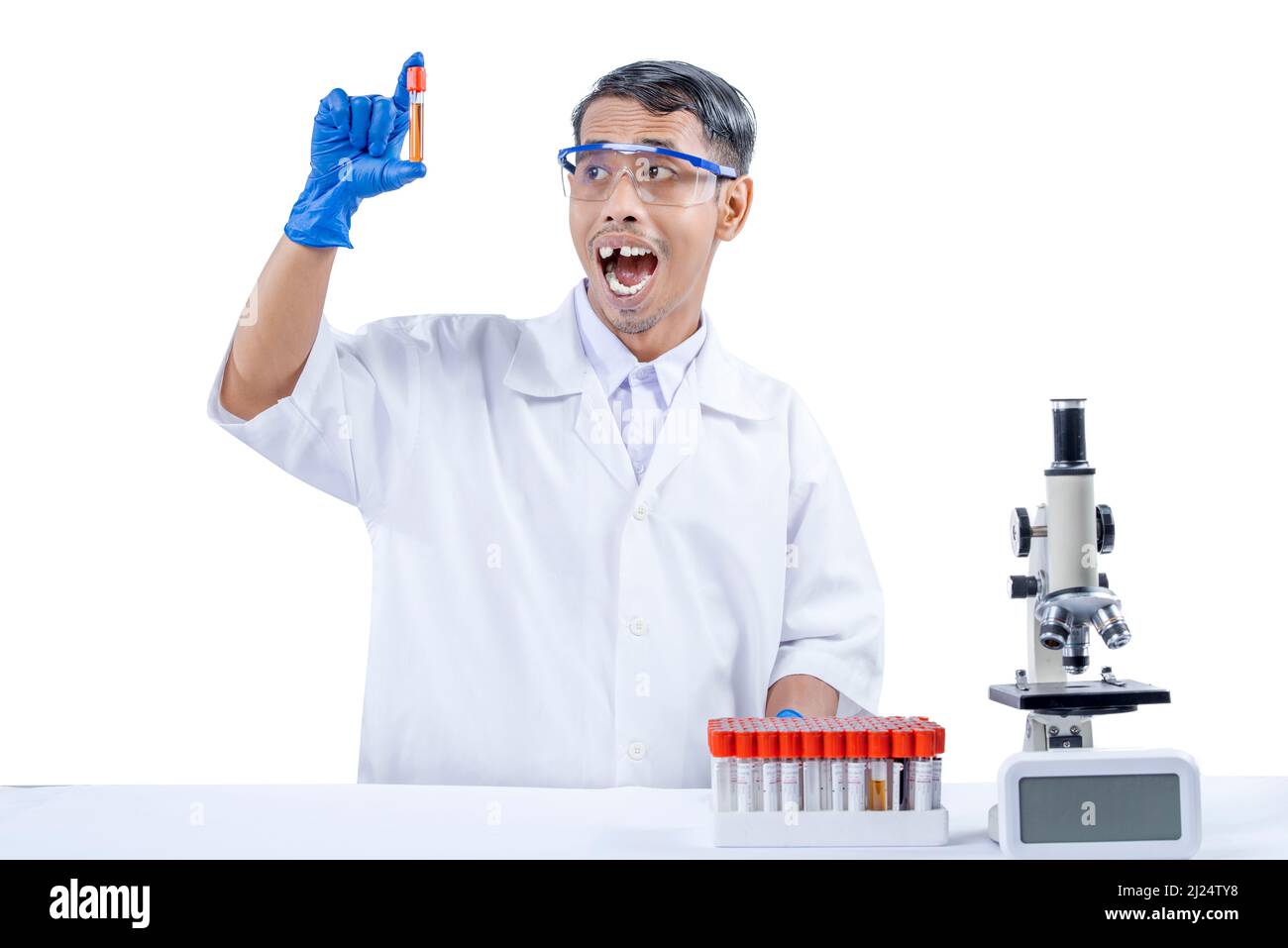 Asian nerd scientist holding a sample tube with a microscope and ...