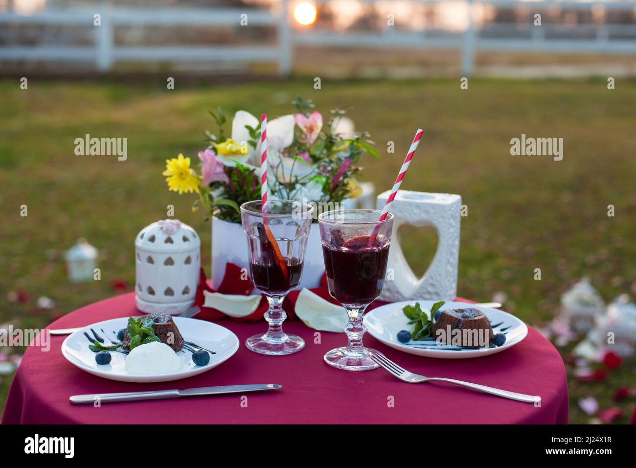 Romantic table for two outdoors Stock Photo - Alamy