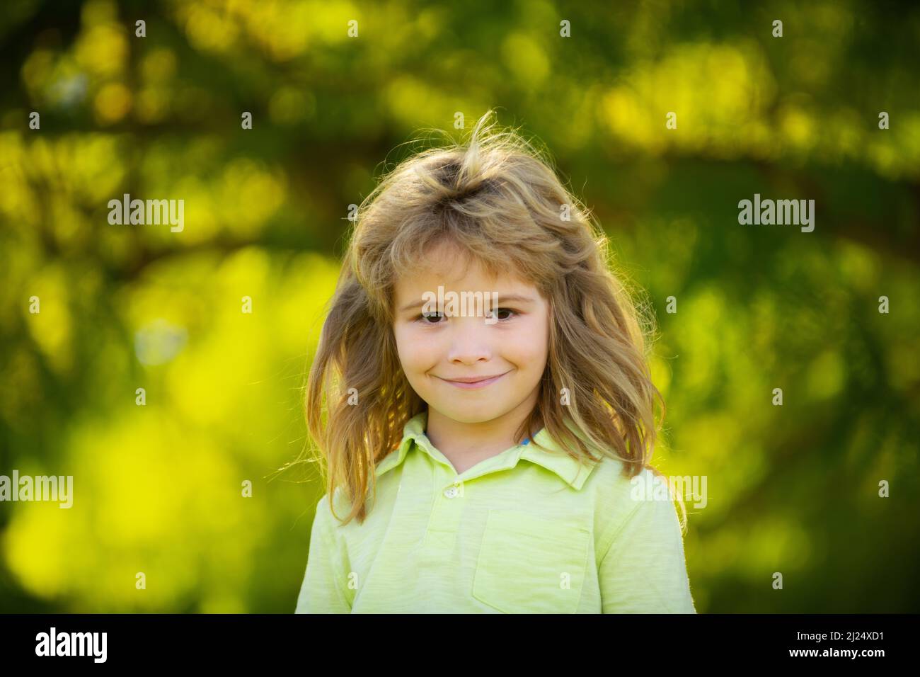 Spring kids portrait. Closeup face of cute smiling spring child. Kid ...