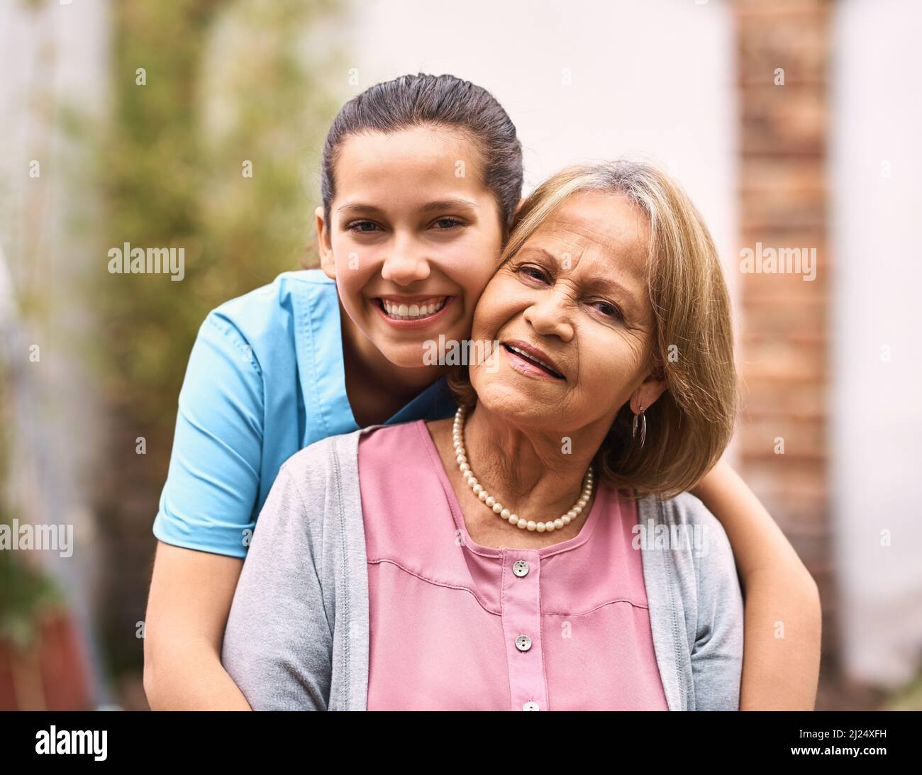 Young patient with carer outside hi-res stock photography and images ...