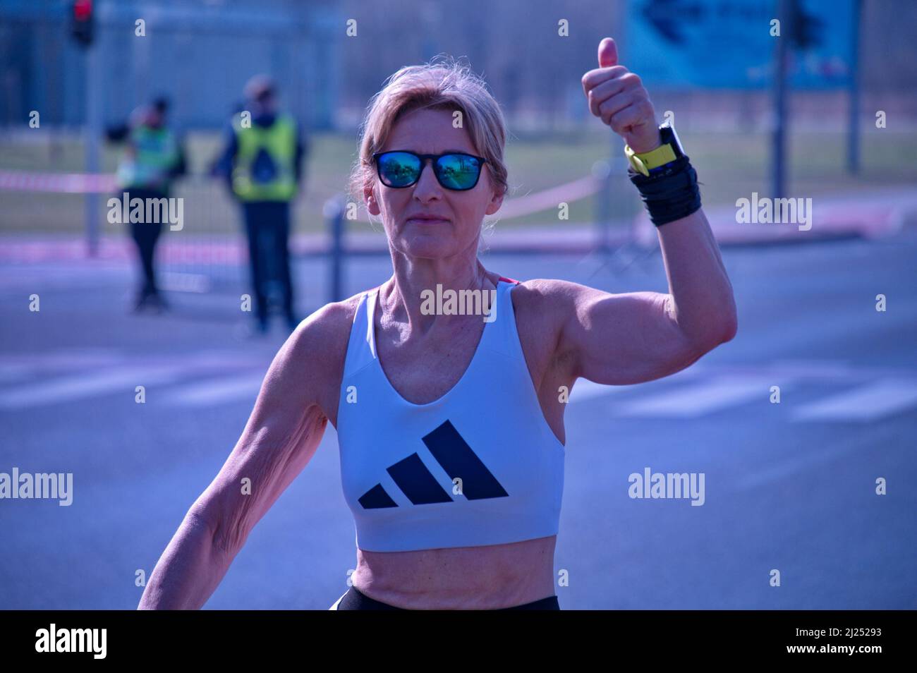 Active senior woman running marathon Stock Photo - Alamy