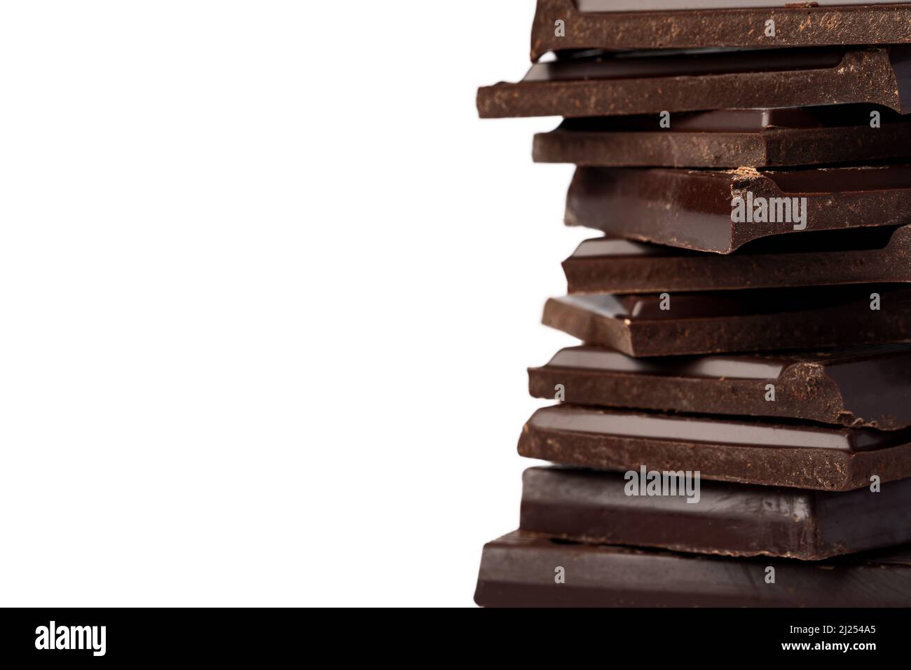 Small dark chocolate pieces isolated on white background Stock Photo ...