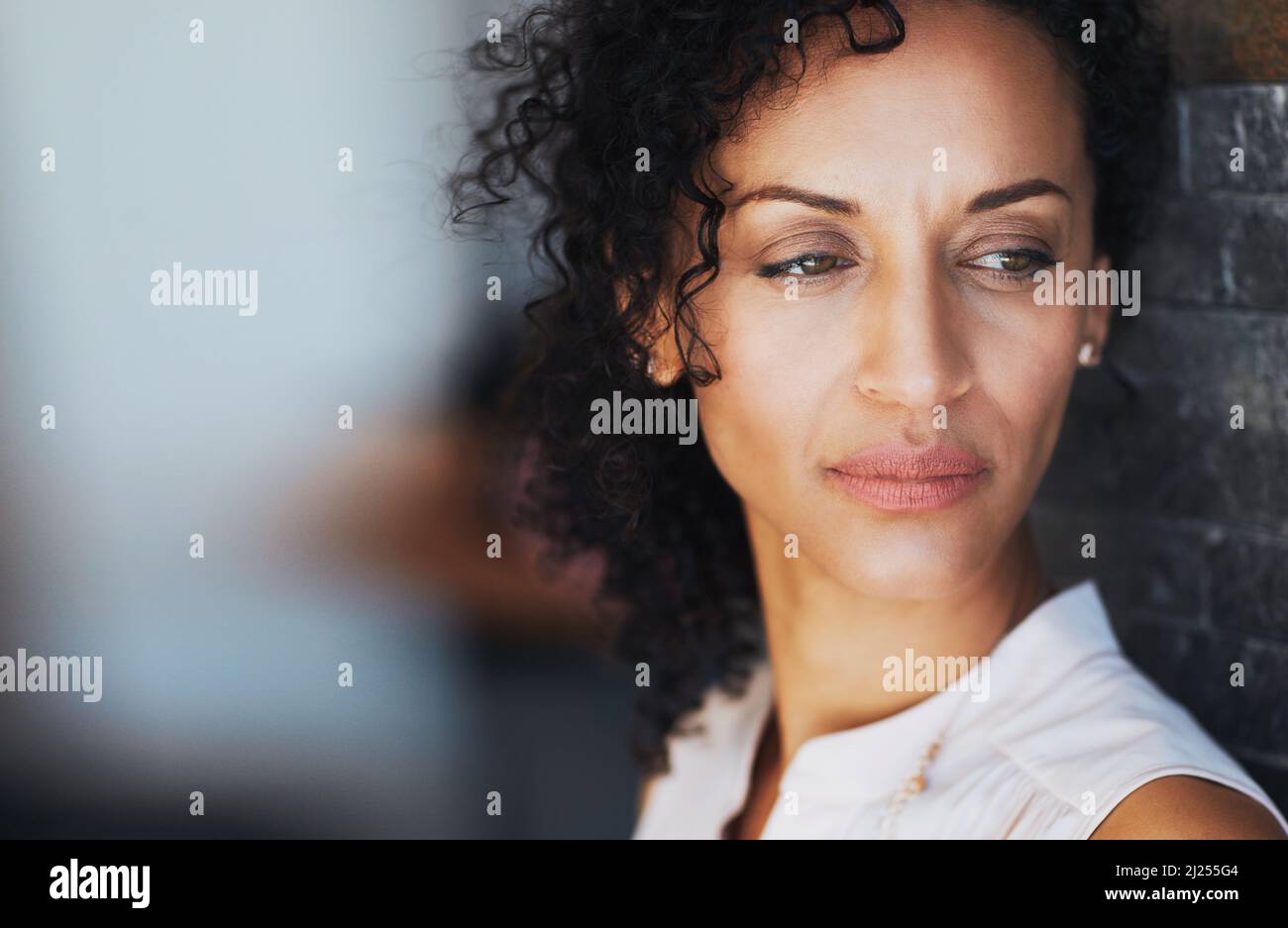 Some days are harder than others. Shot of an introspective woman ...