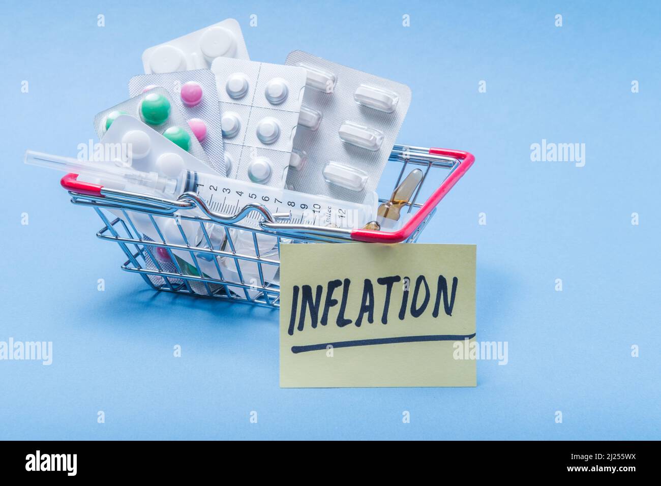 A basket with medical preparations in it on a blue background with ...