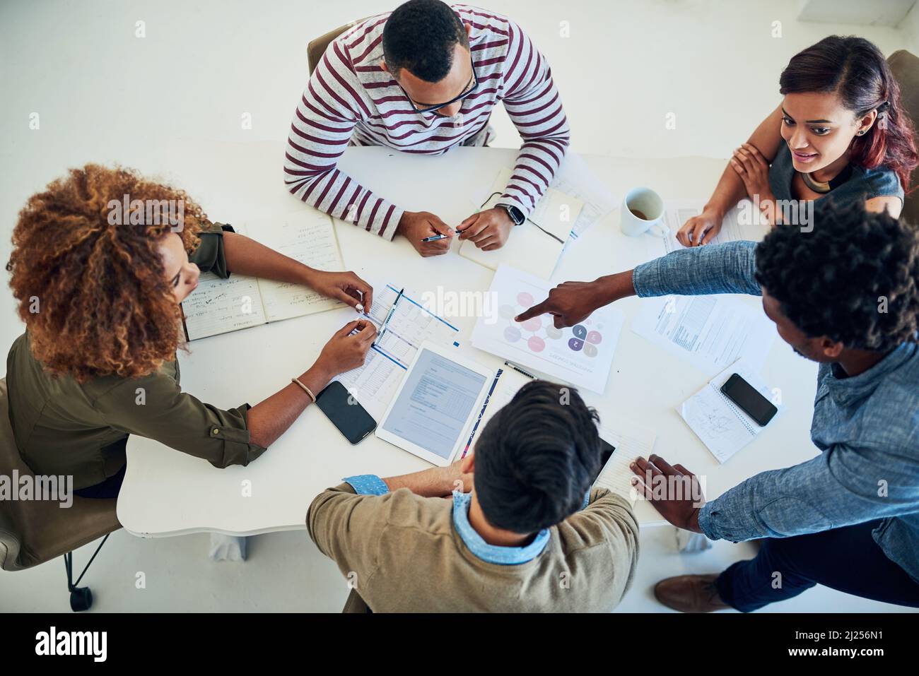 Sharing the workload hi-res stock photography and images - Alamy