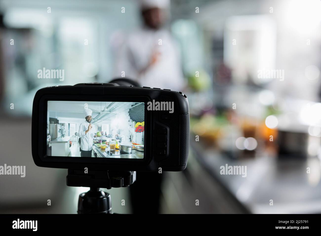 Close up camera recording gastronomy expert in restaurant kitchen ...