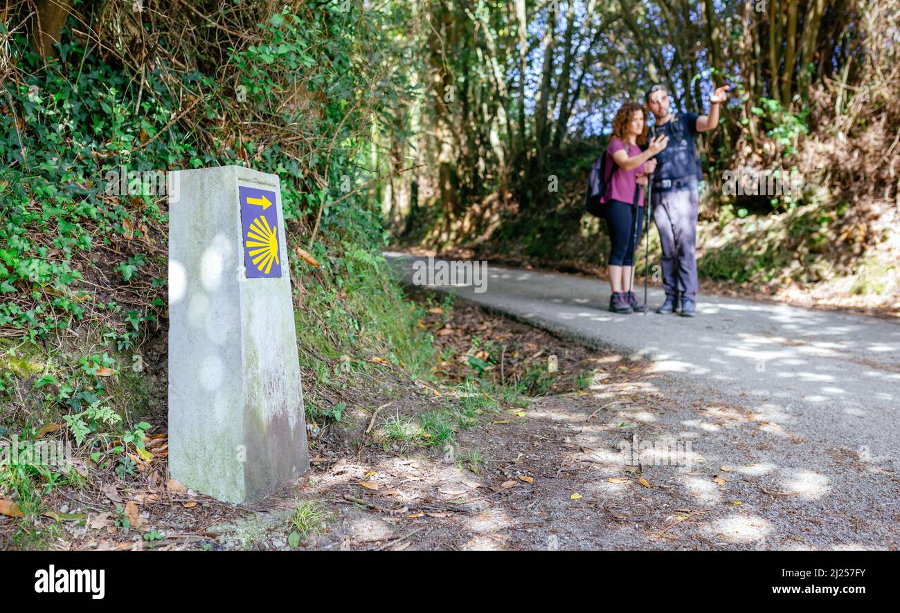 Signpost of Saint James way with pilgrims pointing Stock Photo - Alamy