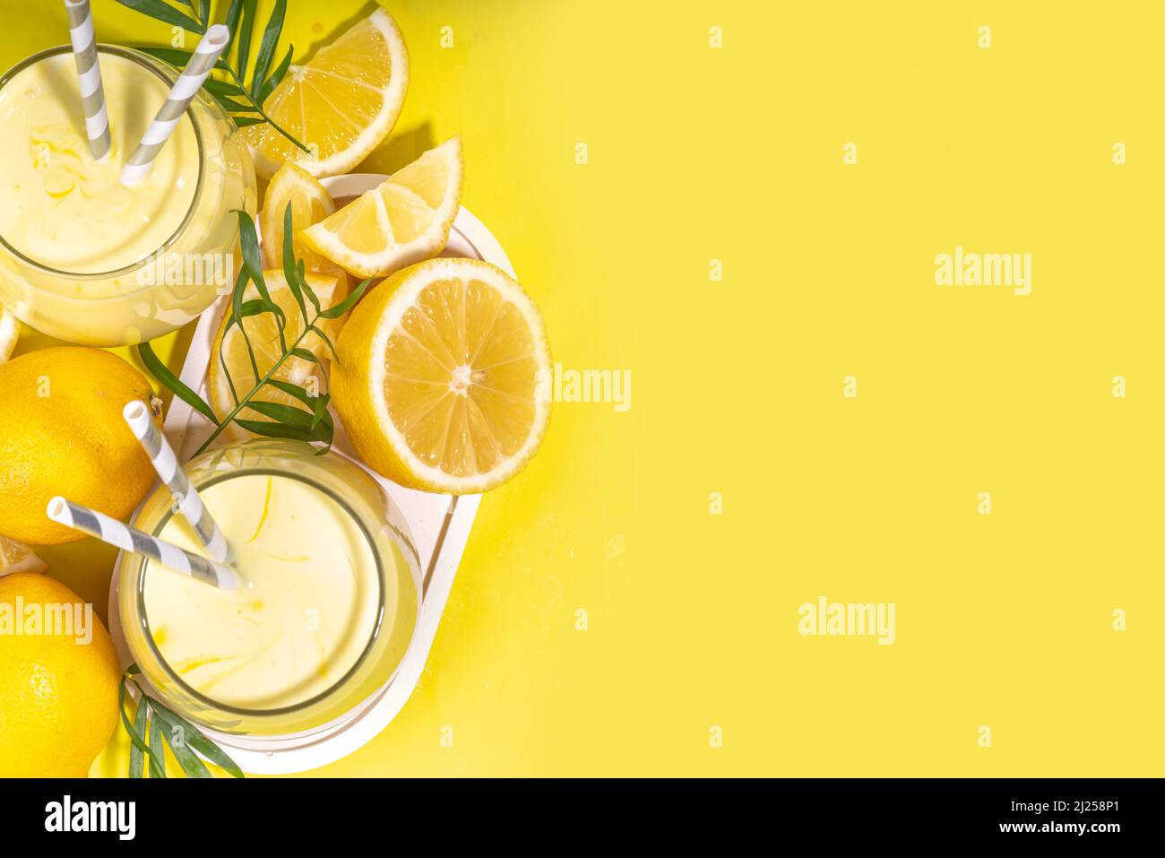 Creamy lemon fruit smoothie, yogurt ar milkshake, Sour sweet drink with ...