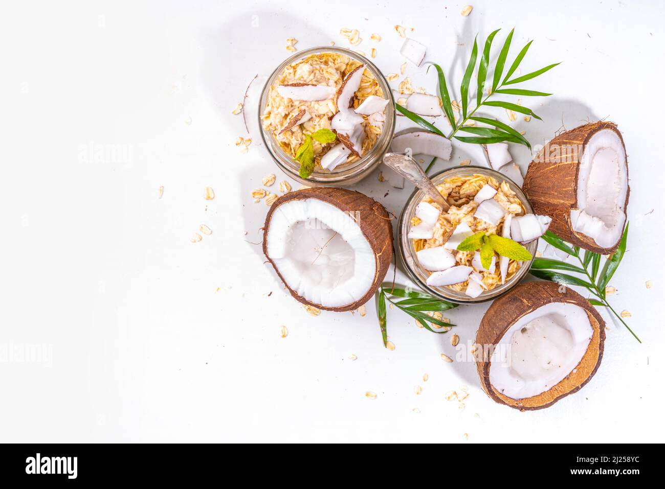 Breakfast overnight oatmeal oats with coconut milk and fresh coconut ...