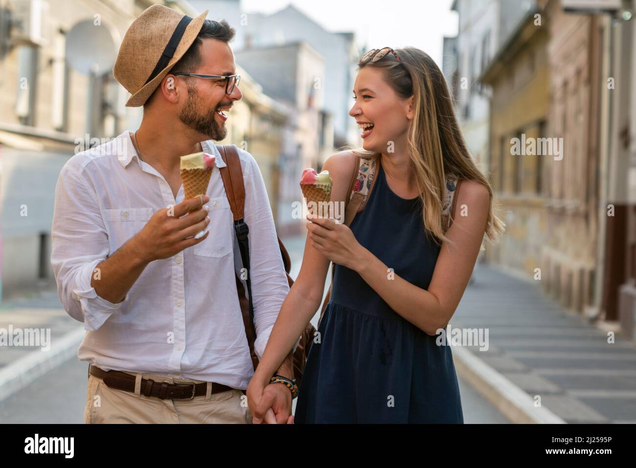 Happy tourist couple in love having fun, traveling smiling together on ...