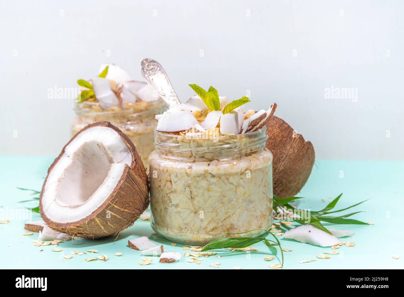 Breakfast overnight oatmeal oats with coconut milk and fresh coconut ...