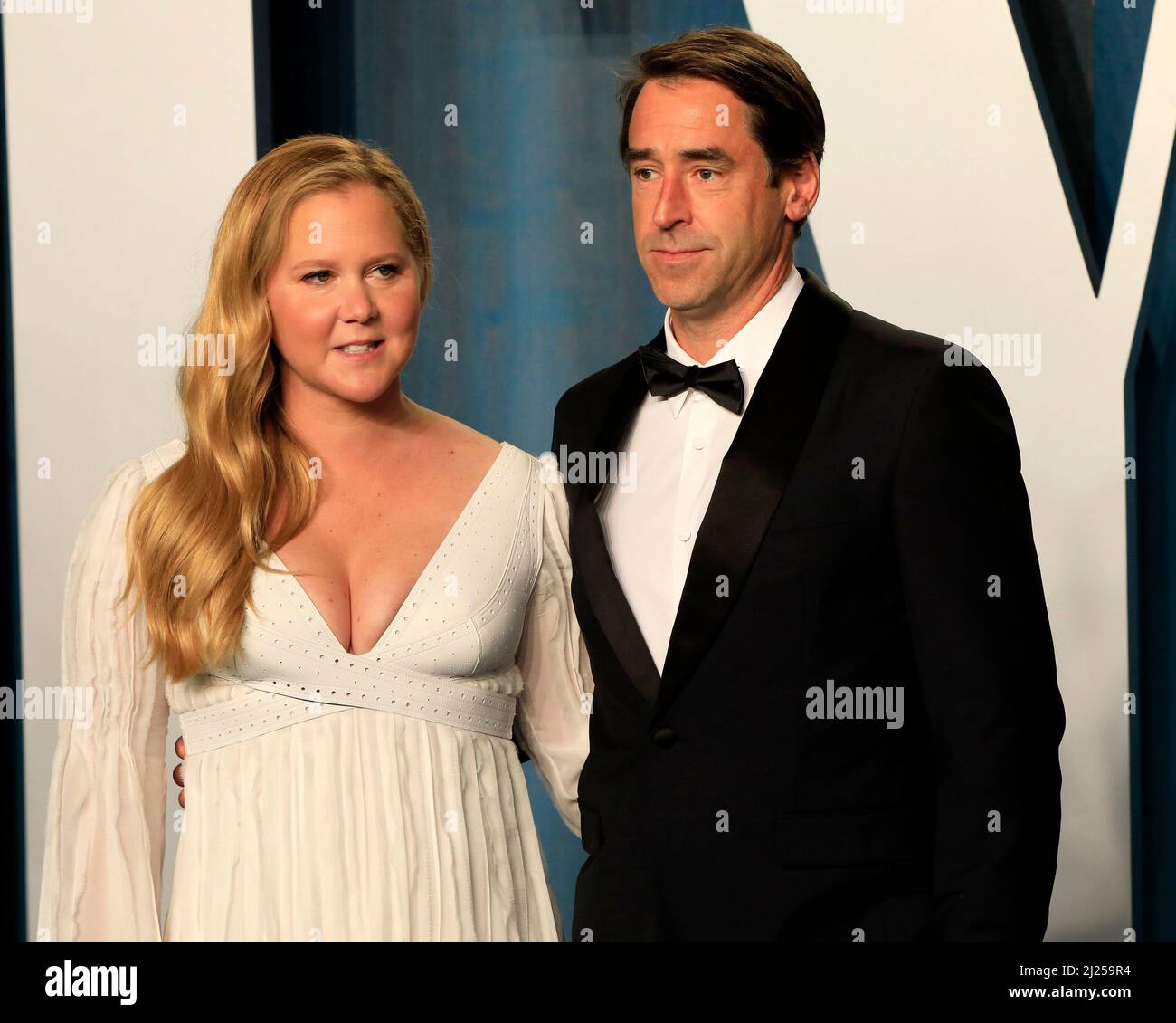 LOS ANGELES - MAR 27: Amy Schumer, Chris Fischer at the Vanity Fair ...